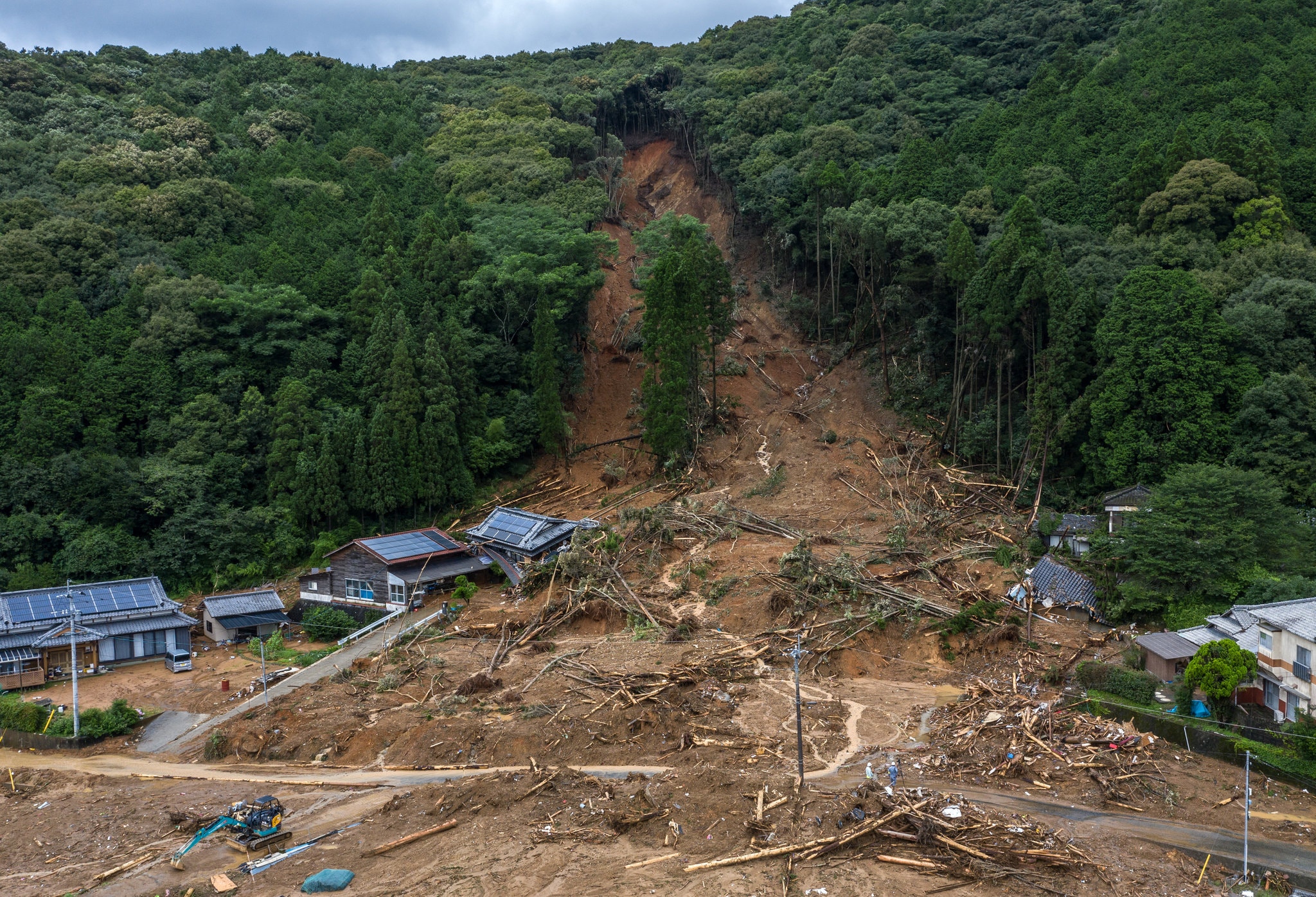 Japan devastated by extreme floods and landslides: At least 58 ...